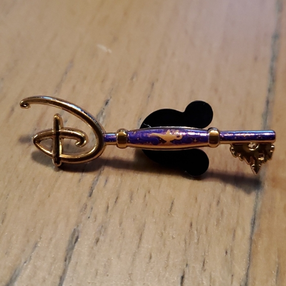 Disney | Jewelry | Disney Aladdin Mystery Key Pin | Poshmark